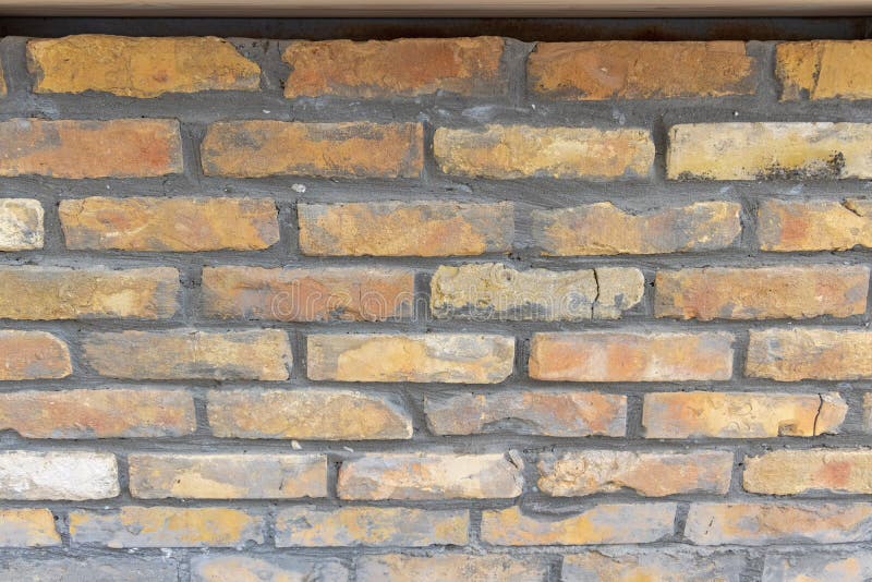 Yellow Bricks Wall stock photo. Image of wall, brick - 230457834