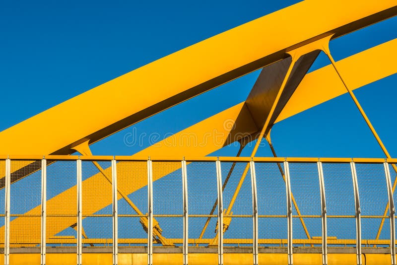 Yellow bridge, blue sky stock photo. Image of framework - 51551406