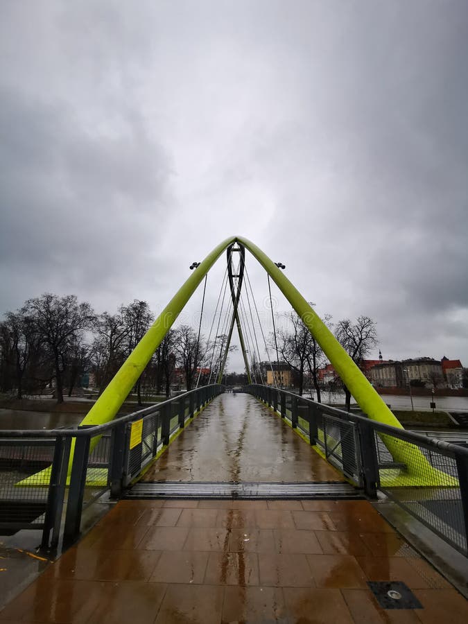 Yellow Bridge with Rain Reflected on the Stone Ground Stock Image ...