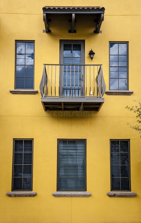 Yellow & Brown Building in Tropical Setting Stock Image - Image of ...