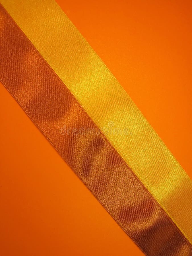 Yellow and brown ribbon stock photo. Image of band, details - 16532072