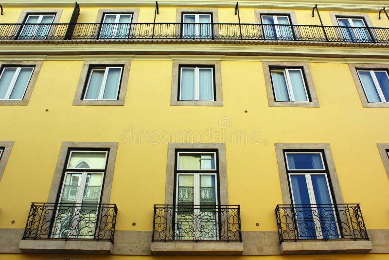 Yellow building stock photo. Image of design, doors, home - 26102398
