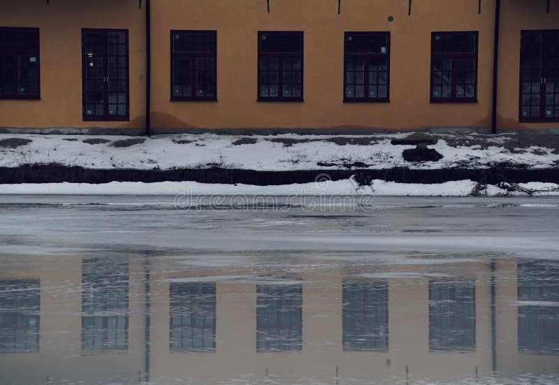 Yellow Building Next To Lake Stock Image - Image of window, facade ...