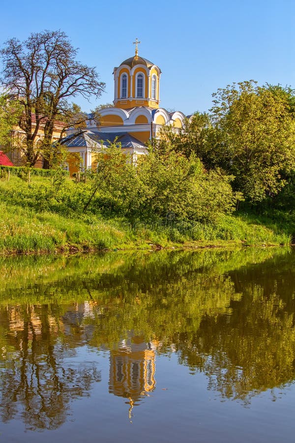Yellow Building of Orthodox Church, Reflection in the Lake Stock Image ...