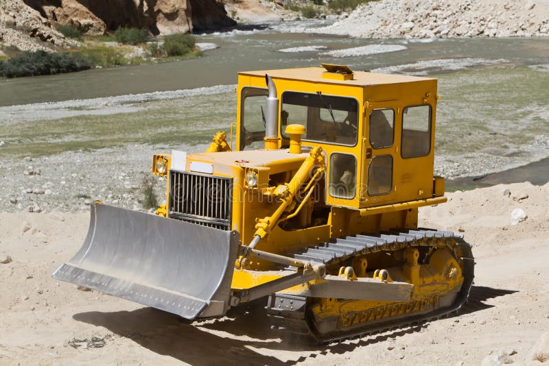 Yellow bulldozer stock photo. Image of industry, ground - 22885484