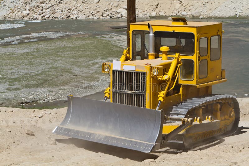 Yellow bulldozer stock photo. Image of activity, iron - 22885486