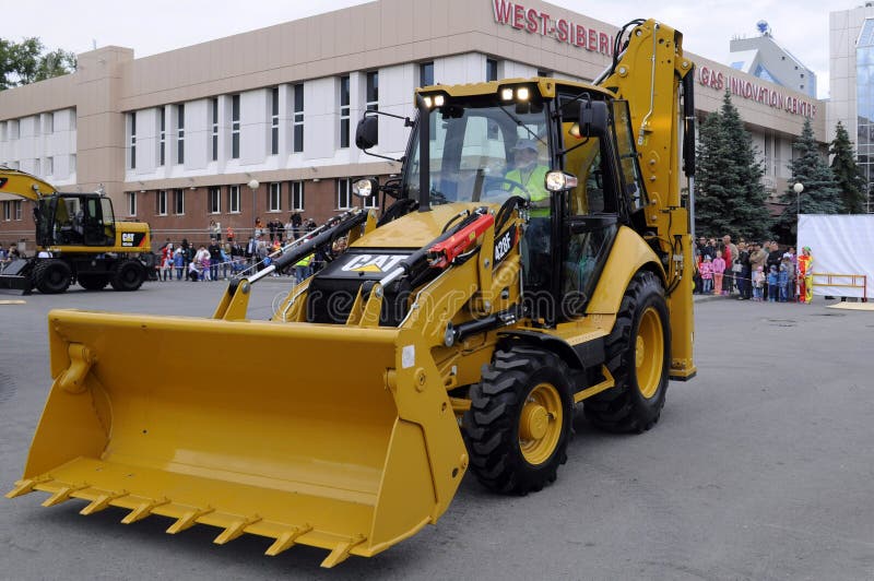 The Yellow Bulldozer is on the Square in the City. Editorial ...