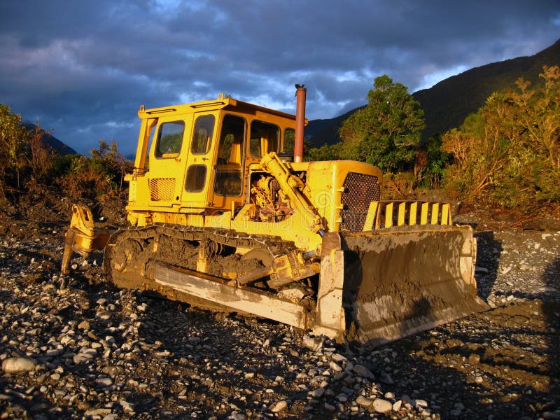 Yellow Bulldozer on a Sunny Day Stock Image - Image of blue, excavator ...