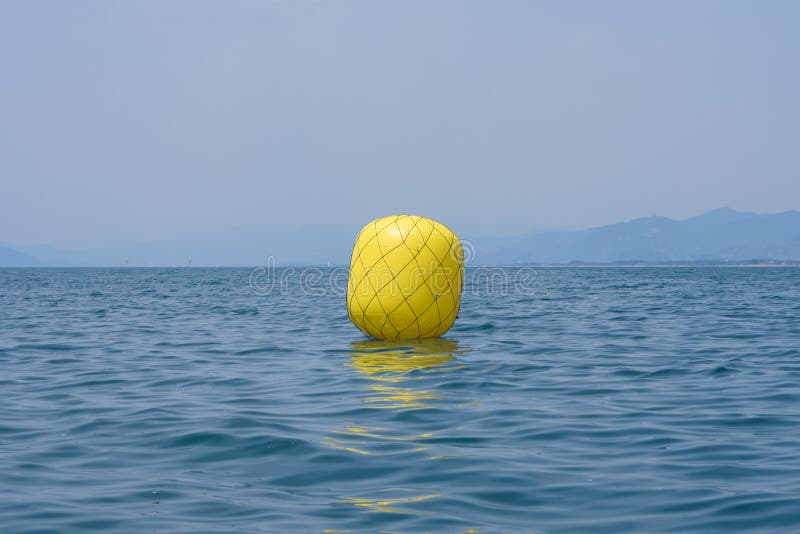 Yellow buoy for regatta stock image. Image of boat, ocean - 55526217
