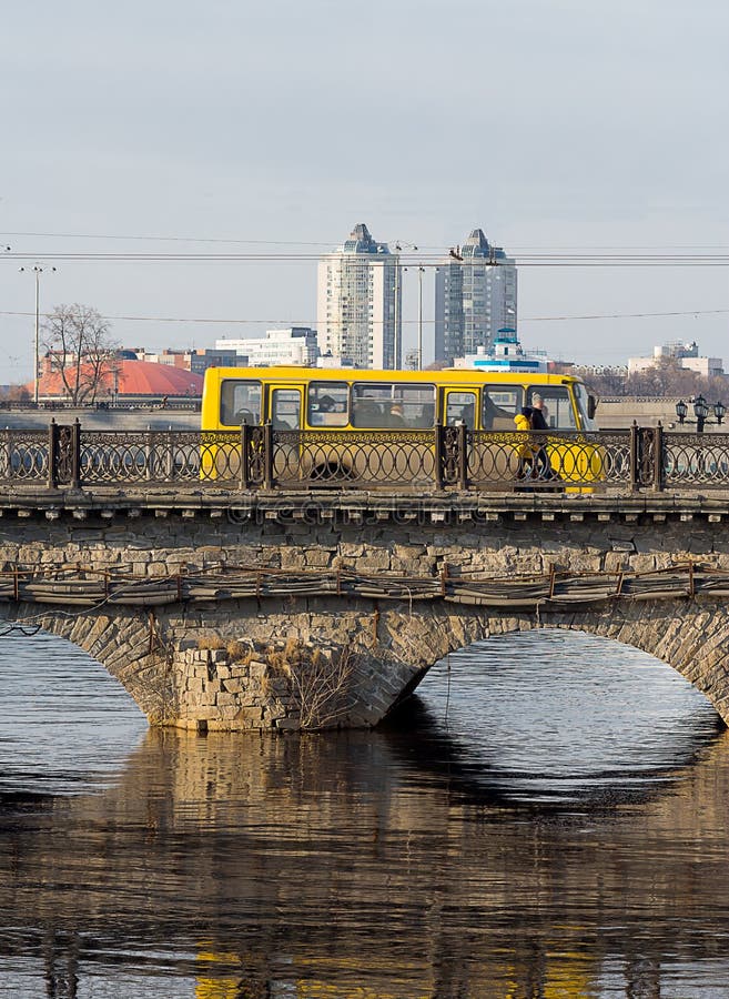 Yellow Bus on a Stone Bridge Editorial Photo - Image of ancient, colors ...