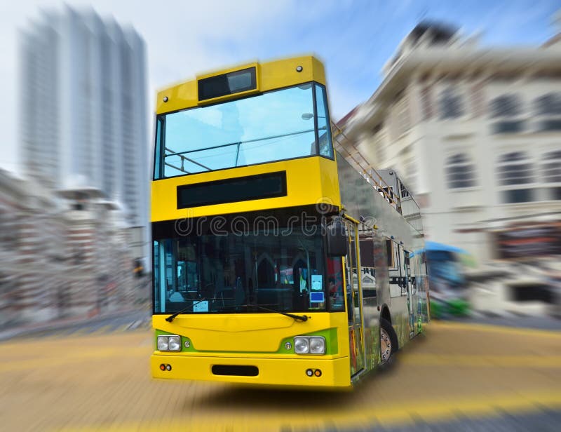 A Yellow Bus on the Street Corner Stock Photo - Image of turns, fast ...