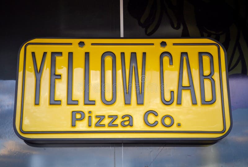 Yellow Cab Pizza Co. sign editorial image. Image of beach - 209640230