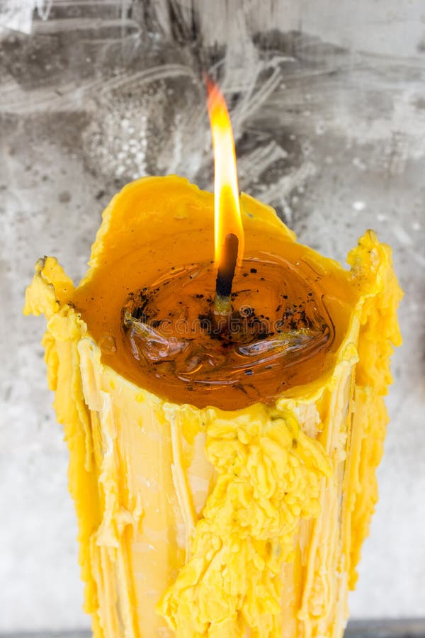 Lone yellow candle stock photo. Image of calming, easter - 4351974