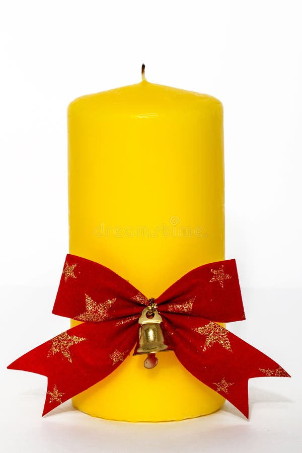Yellow Candle with a Red Bow on Stock Photo - Image of ribbon, studio ...