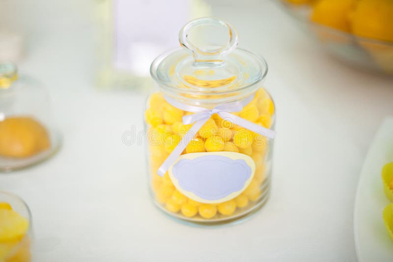 Yellow Candy in a Glass Jar on Sweet Table Stock Photo - Image of ...
