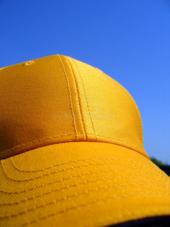 Yellow cap stock photo. Image of protection, detail, bright - 902682