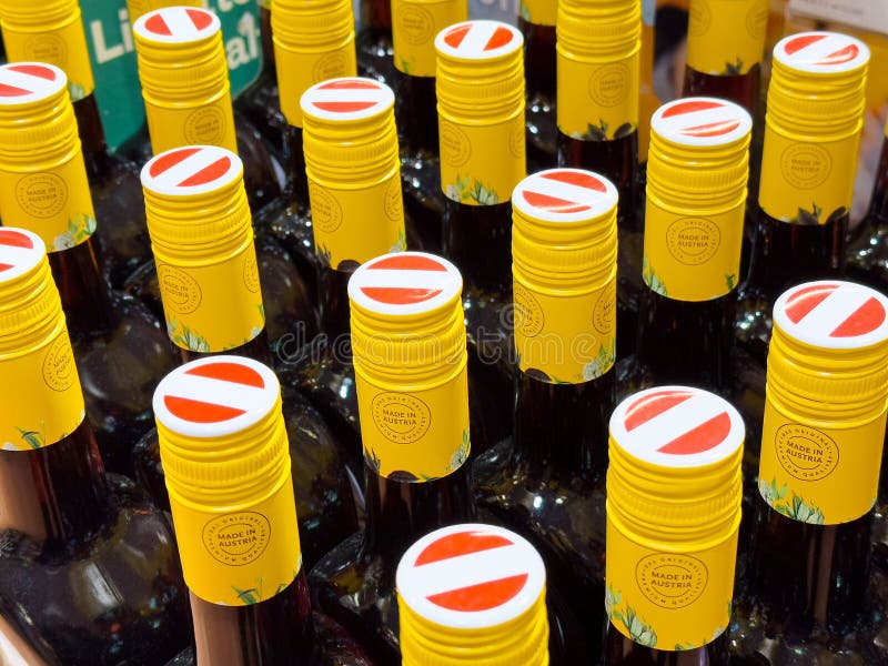Yellow Capped Bottles with Red Stripe from Austria Editorial ...