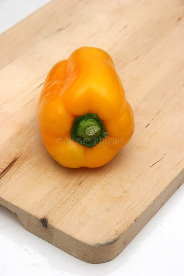 Yellow capsicum stock photo. Image of board, ingredient - 982728