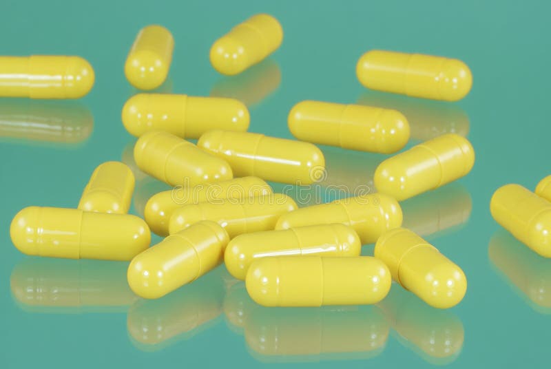 Yellow capsules stock photo. Image of yellow, capsule - 18243096