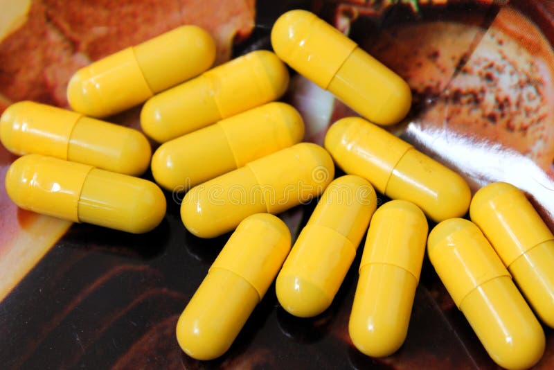 Yellow capsules stock image. Image of help, capsule, health - 27701215