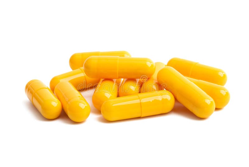 Yellow capsules isolated stock image. Image of pills - 148832815