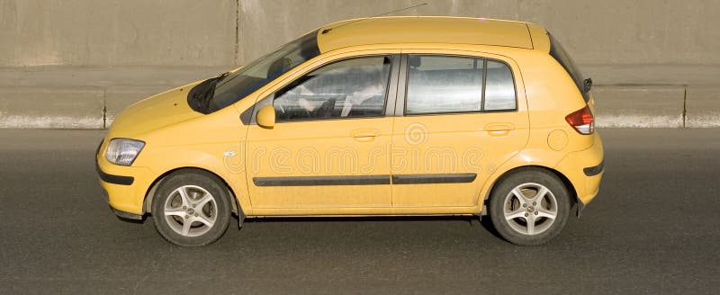 Yellow car stock image. Image of parks, driving, road - 3346381