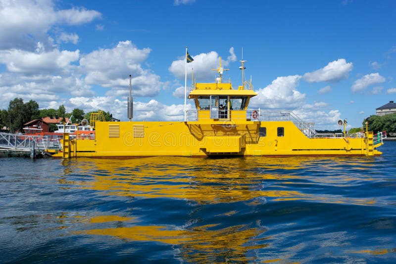 A Yellow Car Ferry at the Dock Stock Photo - Image of water, ferry ...