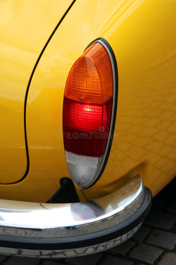 Yellow Car, Rear Light and Bumper Stock Image - Image of bright ...