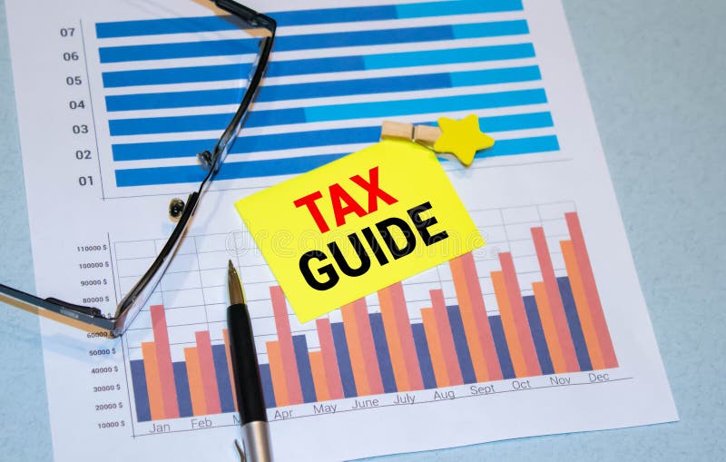 Yellow Card with Text TAX GUIDE on Tax Forms Stock Photo - Image of ...