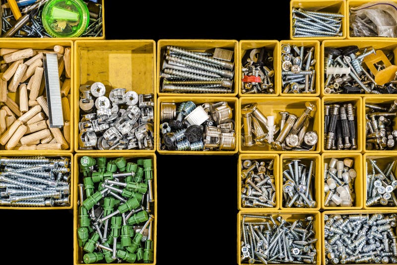 Yellow Case with Small Construction Objects. Many Storage Compartments ...