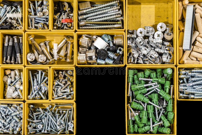 Yellow Case with Small Construction Objects. Many Storage Compartments ...