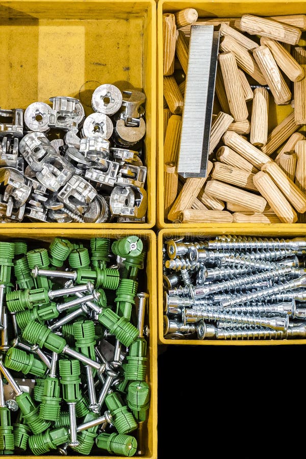 Yellow Case with Small Construction Objects. Many Storage Compartments ...