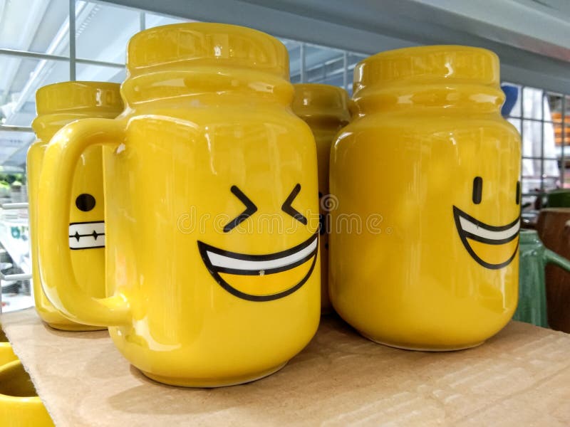 Yellow Ceramic Cup with Smile Icon, Very Cute Glass Cup Stock Photo ...
