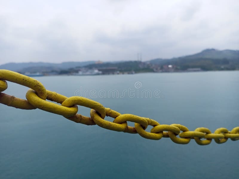 Yellow chains on the ferry stock image. Image of life - 229608755