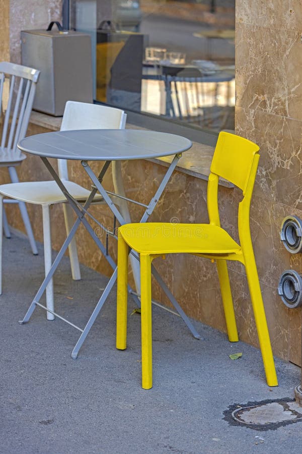 Yellow Chair with Table stock photo. Image of structure - 349597698