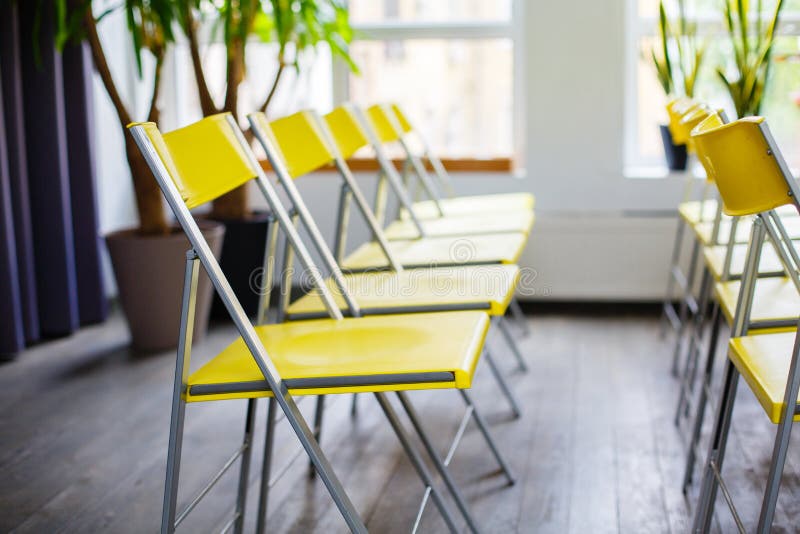 Yellow Chairs in a Room. Interior with Row of Yellow Chairs Stock Image ...