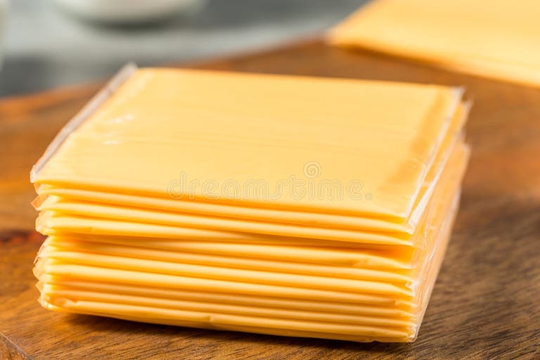 Yellow Cheddar American Cheese Singles Stock Photo - Image of product ...
