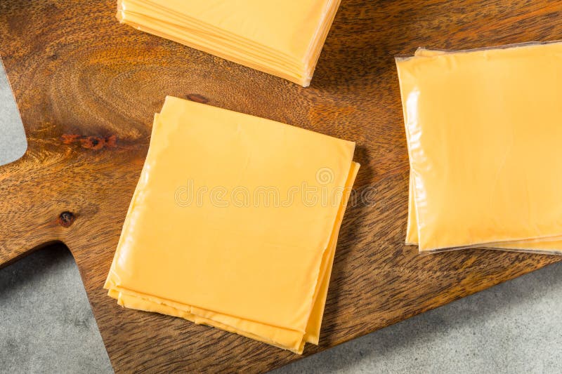 Yellow Cheddar American Cheese Singles Stock Photo - Image of stack ...