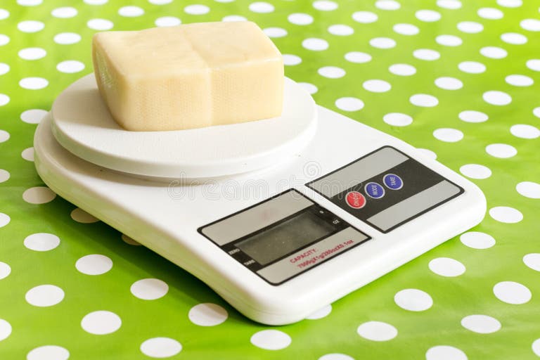 Yellow Cheese on the Kitchen Digital Scale Stock Photo - Image of ...