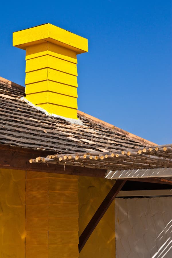 Yellow Chimney and Blue Sky Stock Image - Image of outdoor, building ...