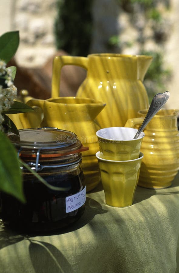 Yellow China Jugs and Cups,jar of Jam Outdoors Stock Image - Image of ...