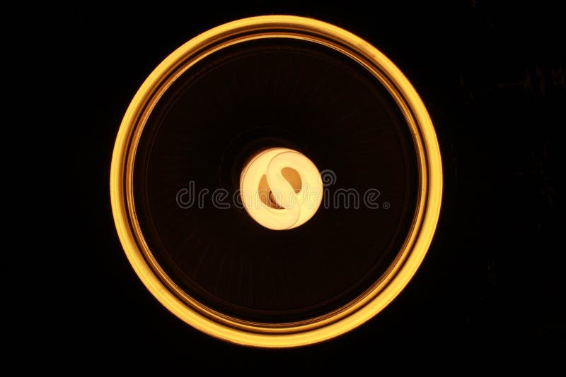 Yellow Circular Coil Lightbulb Stock Photo - Image of branch, bolts ...