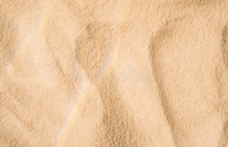 Yellow Clean Sand with Wavy Patterns Under Sunlight Stock Image - Image ...