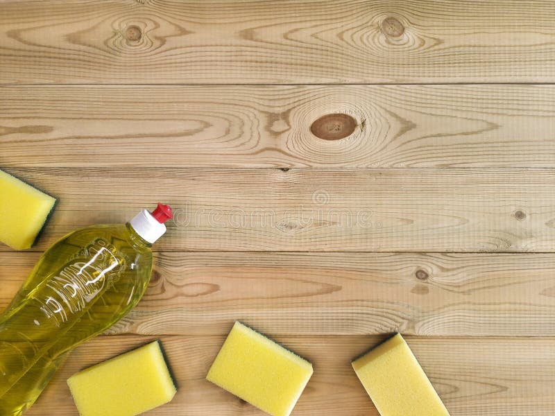 Yellow Cleaning Kit: Dishwashing Gel and Kitchen Sponges. Copy Space ...