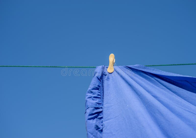 Peg and sheet on line stock photo. Image of detail, bright - 193928656