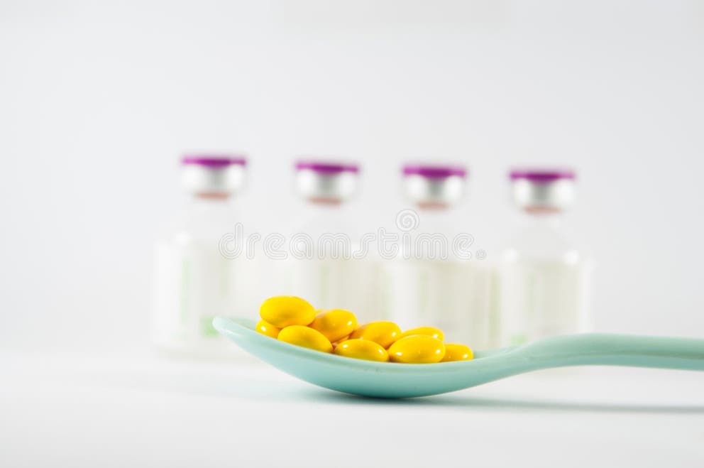 Yellow Coating Tablet in Spoon Stock Photo - Image of prescription ...