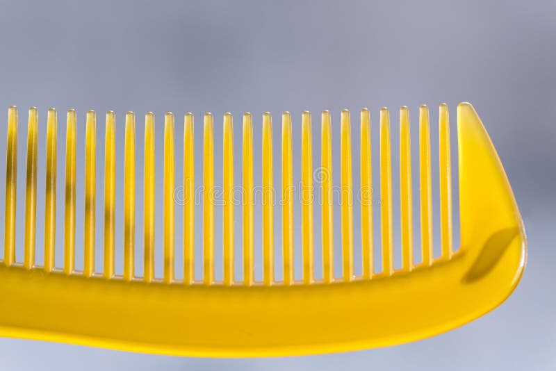 Yellow Color Plastic Comb on White Background Macro View Stock Image ...