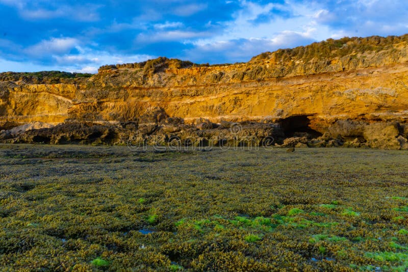 Yellow Colored Cliff Under Cloudy Sky Stock Image - Image of native ...