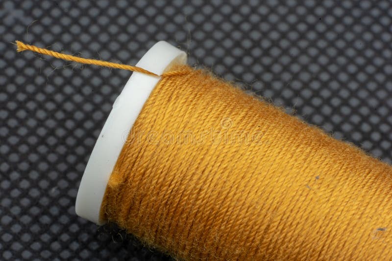 Yellow Colored Fabric Sewing Thread Roll with Visible Lines. Stock ...