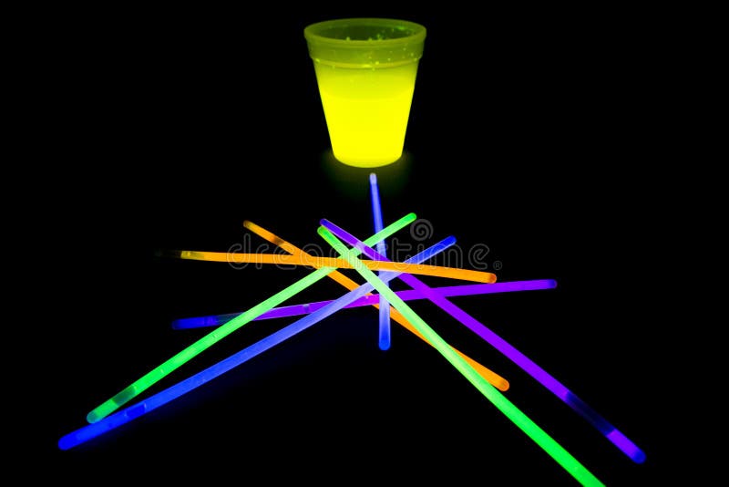 Yellow Colored Fluorescent Glass with Glow Sticks Lights Stock Photo ...